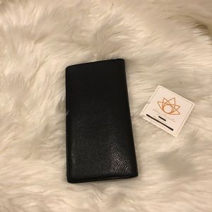 Louis Vuitton | Bags | Brazza Wallet In Noir Taiga Leather | Poshmark
